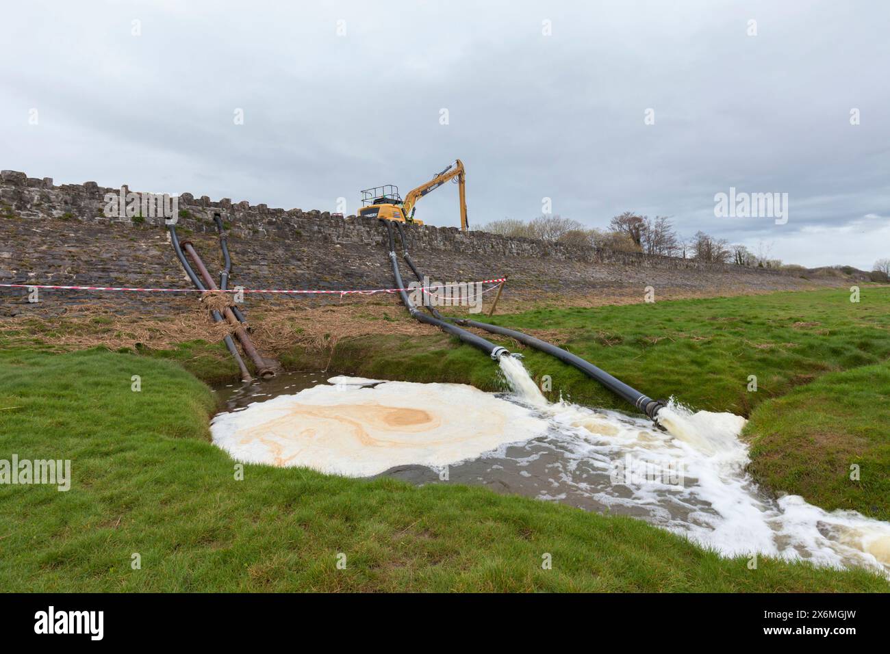 Drainage channel in the salt marsh at Grange over Sands, Cumbria, UK ...