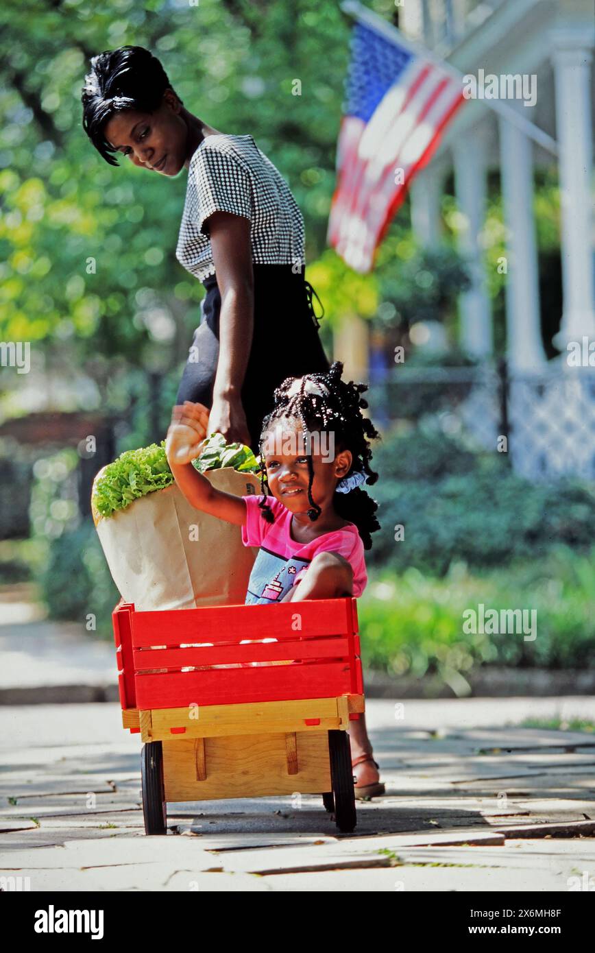 Pushing wagon hi-res stock photography and images - Alamy