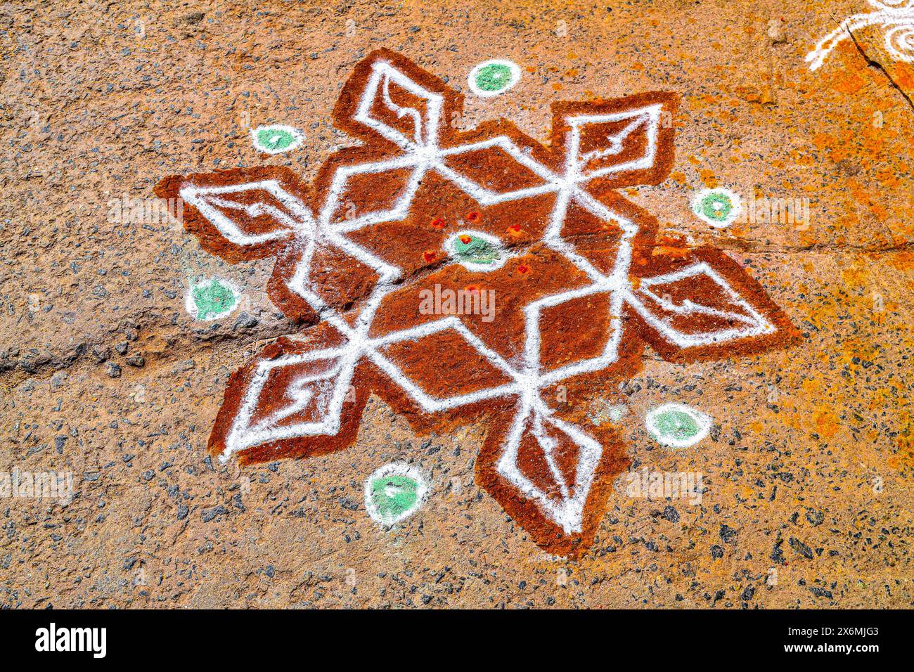 A Kolam in India. Kolam, also known as Muggu in Telugu and Rangoli in ...