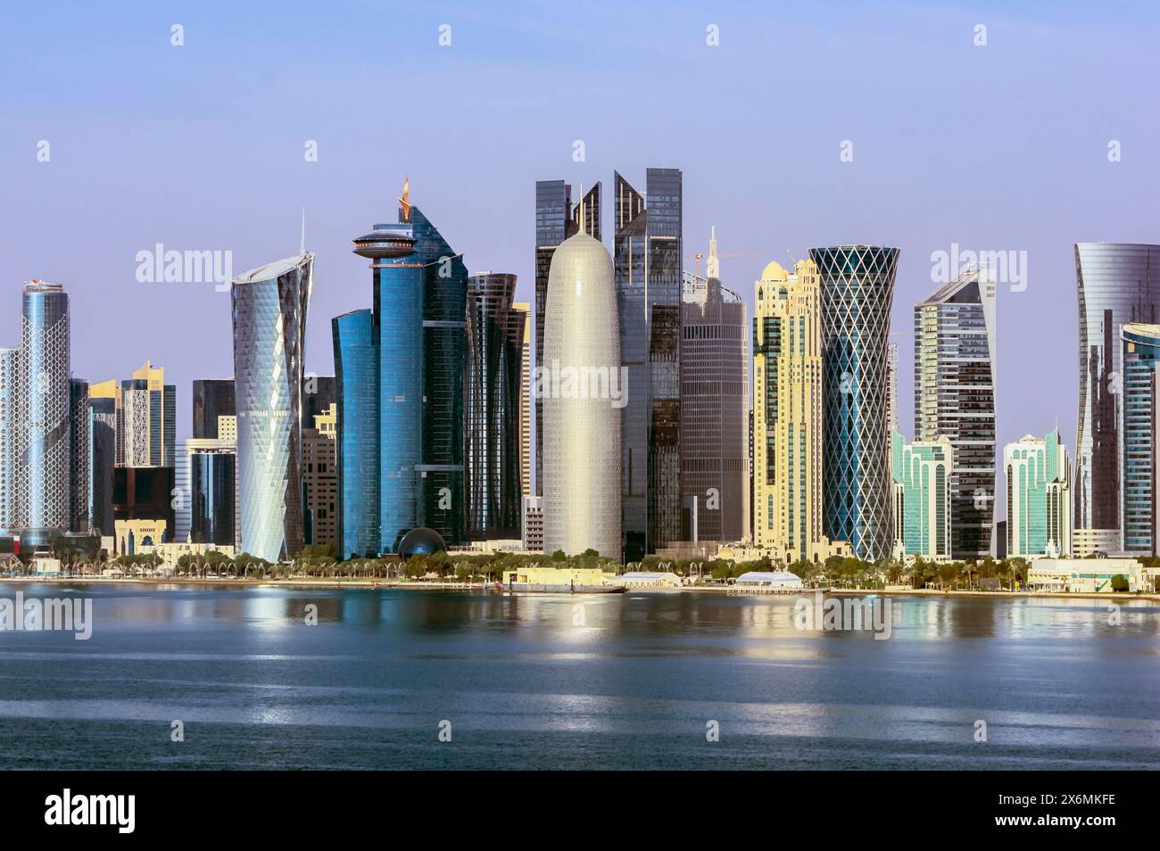Harbor views, the Corniche with skyscrapers and ships in Doha, capital ...