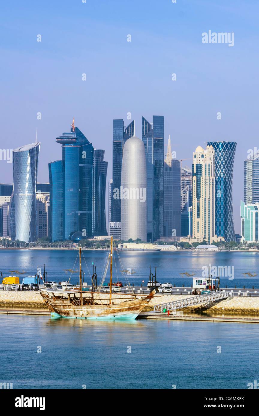 Harbor views, the Corniche with skyscrapers and ships in Doha, capital ...