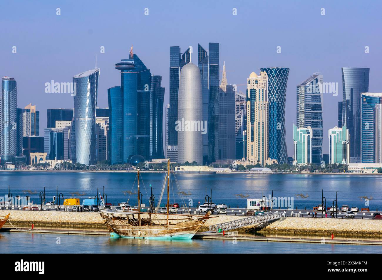 Harbor views, the Corniche with skyscrapers and ships in Doha, capital ...