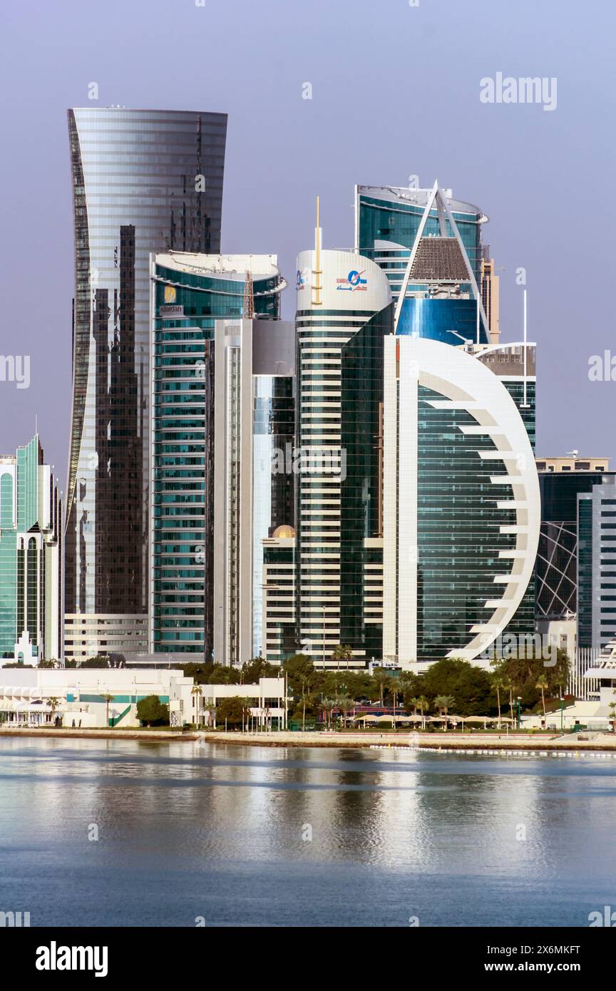 Harbor views, the Corniche with skyscrapers and ships in Doha, capital ...