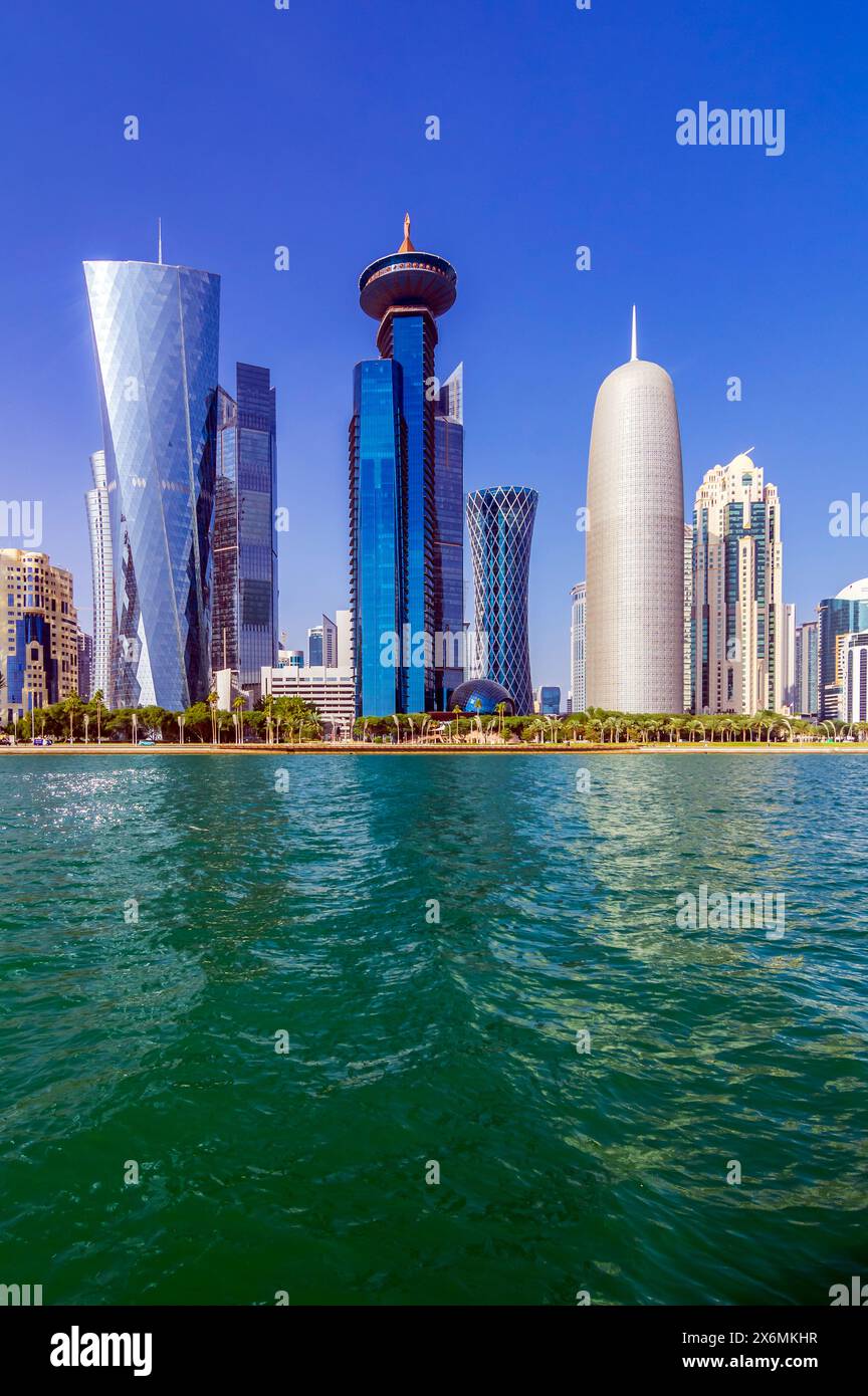 Harbor views with skyscrapers and ships in Doha, capital of Qatar in ...