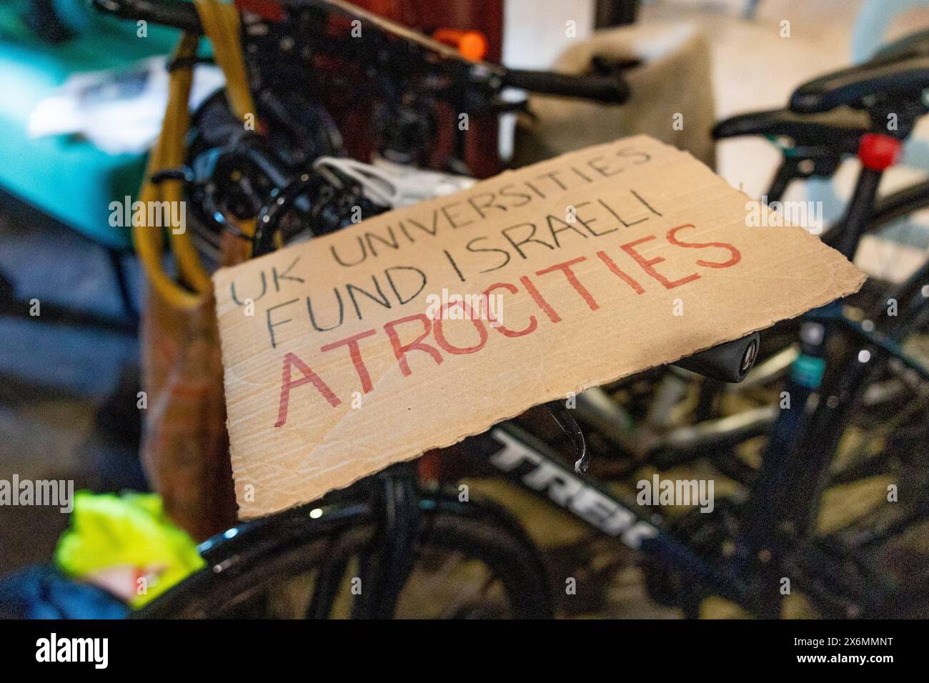 A placard is seen on the bicycle at the encampment base at the Central ...