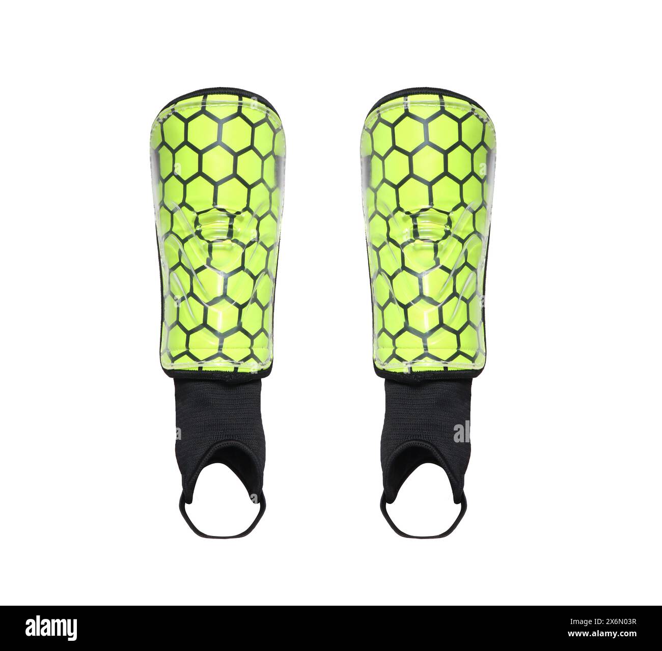 green shin guards pair isolated on white background Stock Photo - Alamy