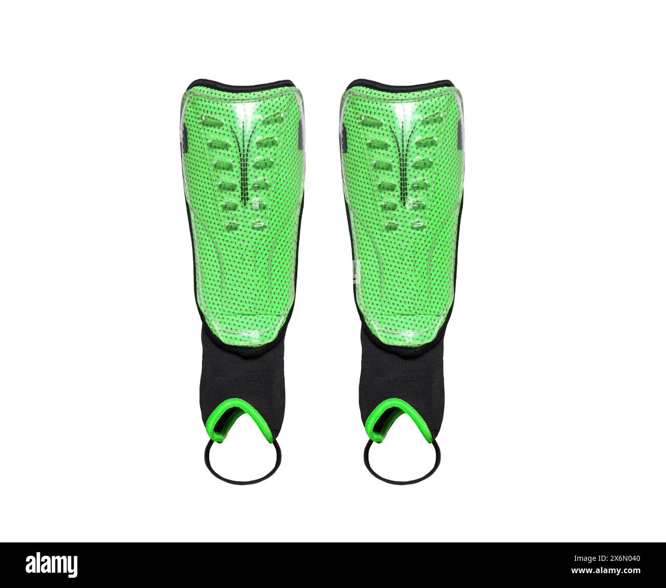 green shin guards pair isolated on white background Stock Photo - Alamy