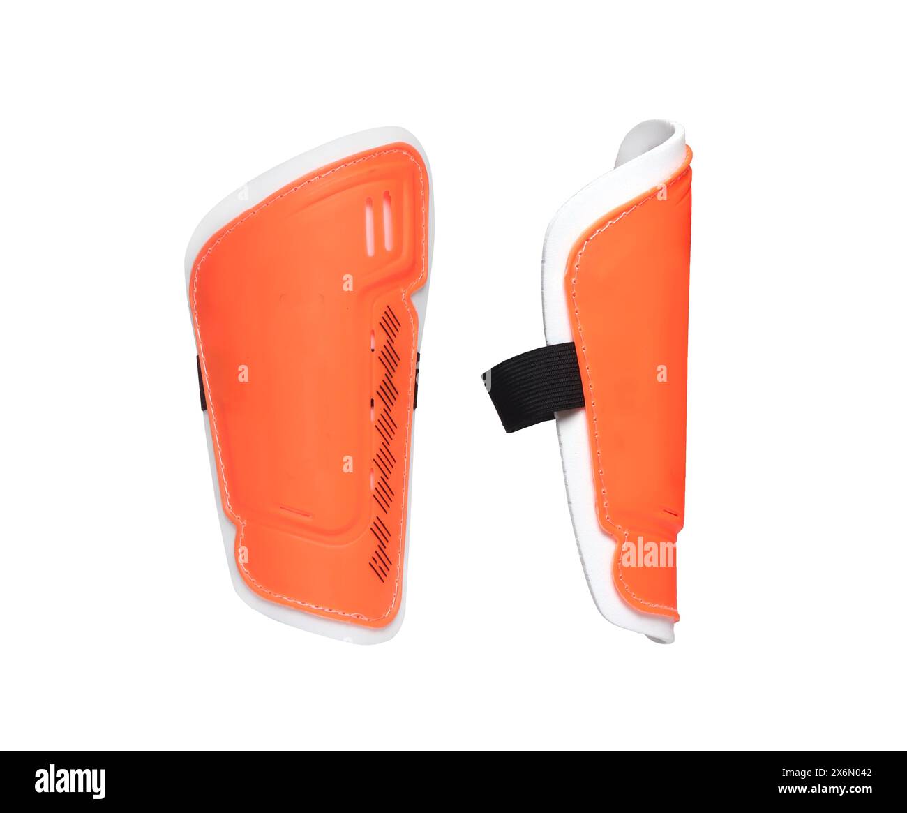 orange shin guards pair isolated on white background Stock Photo - Alamy