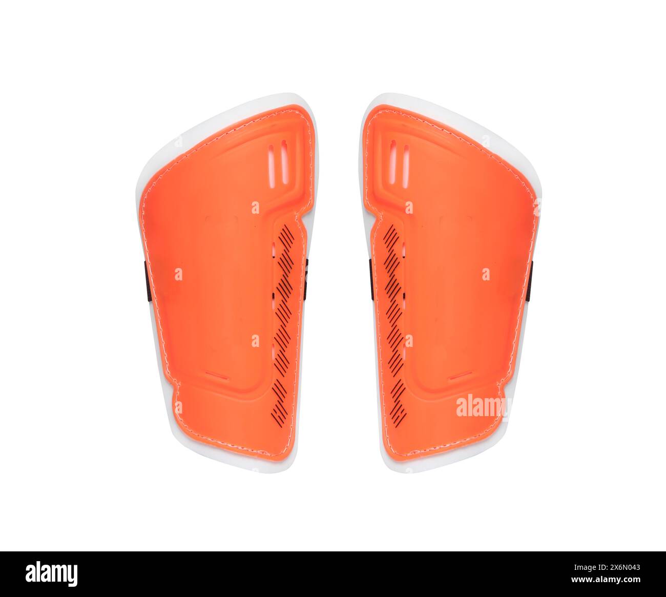 orange shin guards pair isolated on white background Stock Photo - Alamy