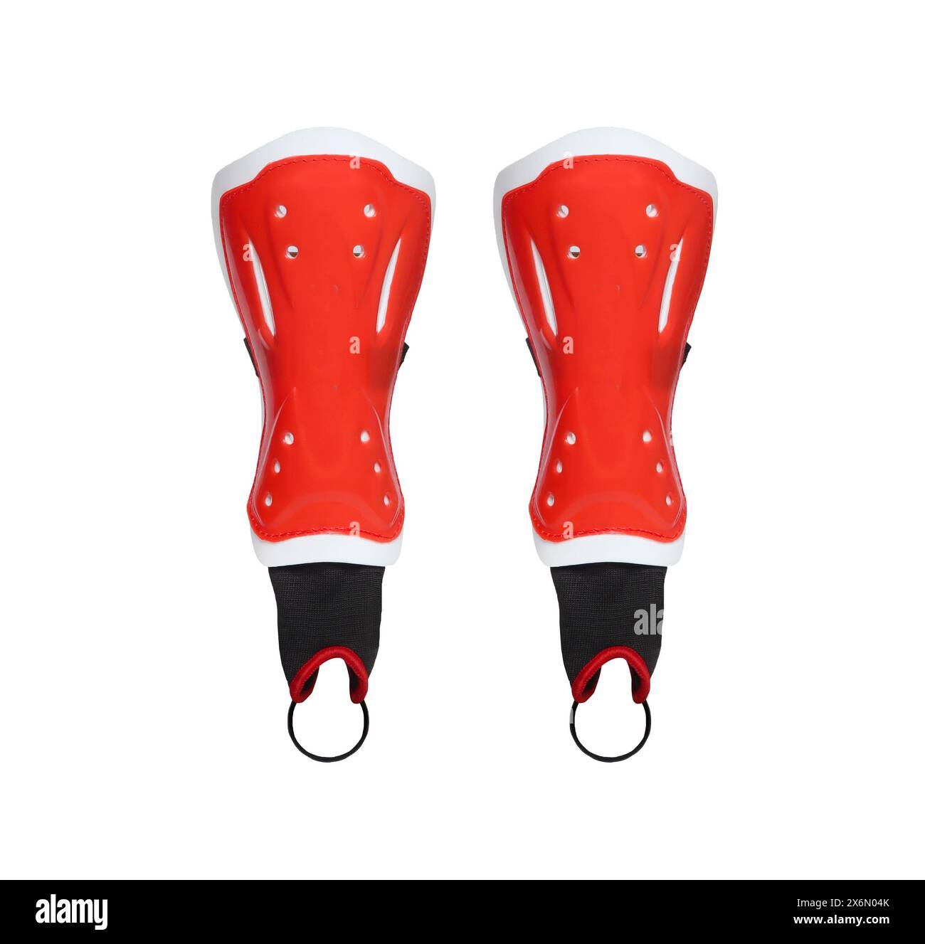 red shin guards pair isolated on white background Stock Photo - Alamy