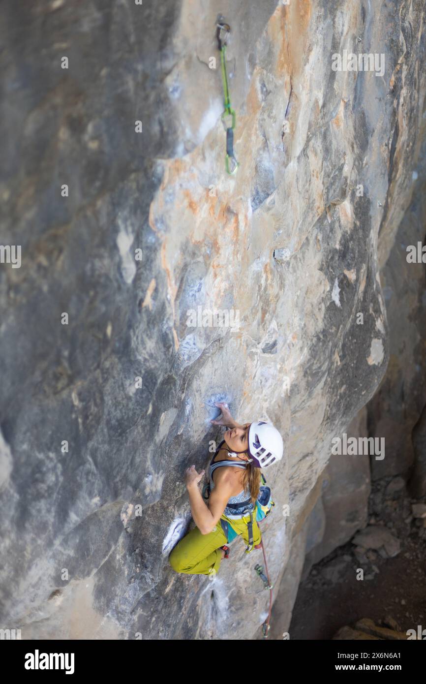 Women climbing in mountains, courage safety and determination Stock ...