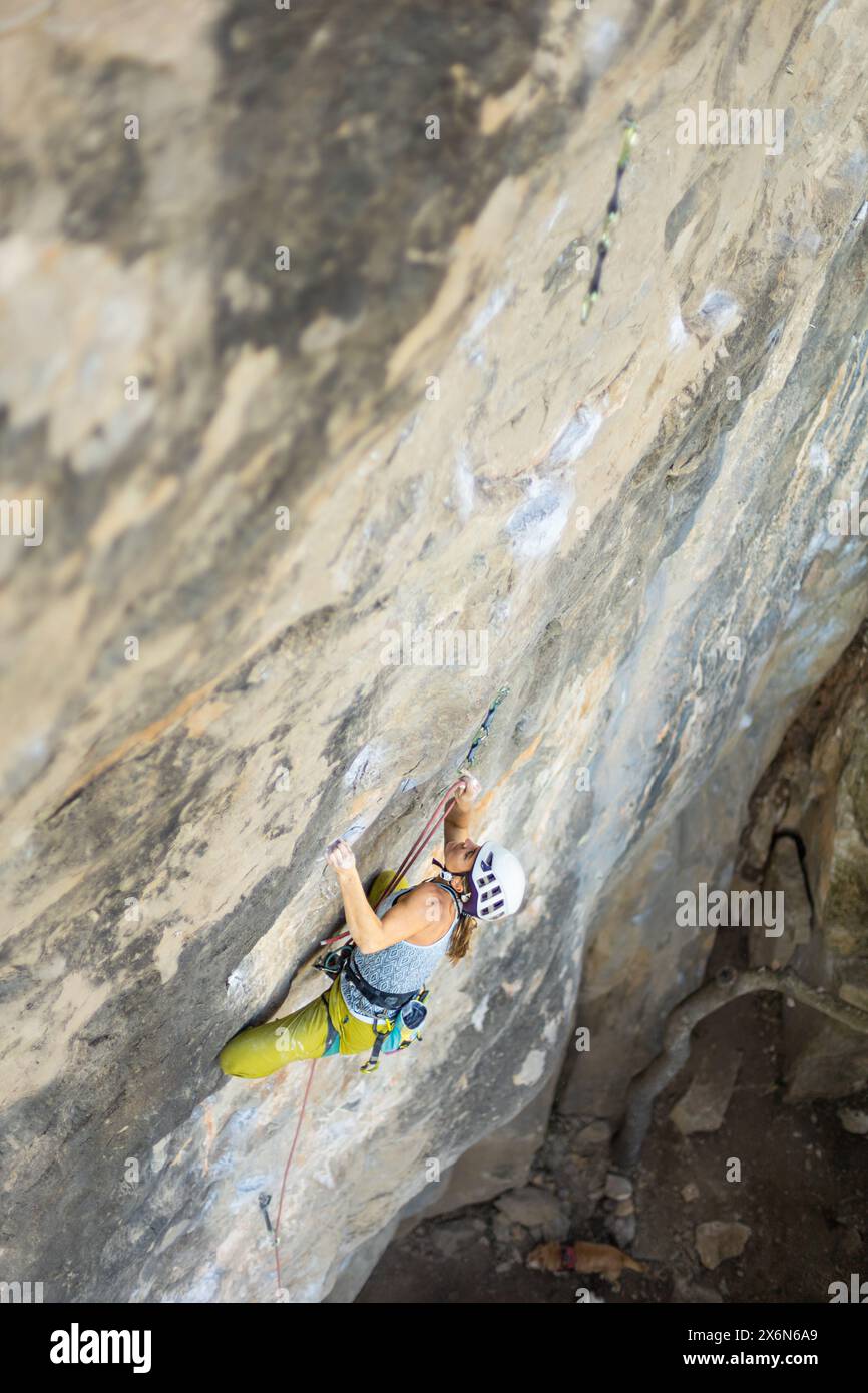 Women climbing in mountains, courage safety and determination Stock ...