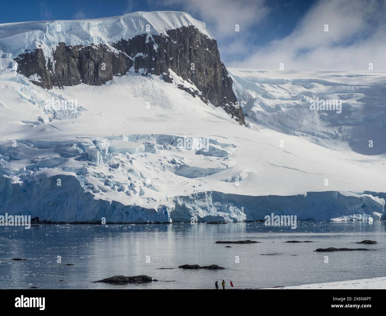 Black icy cliffs rise above D’Hainaut Island, Mikkelsen Harbour ...