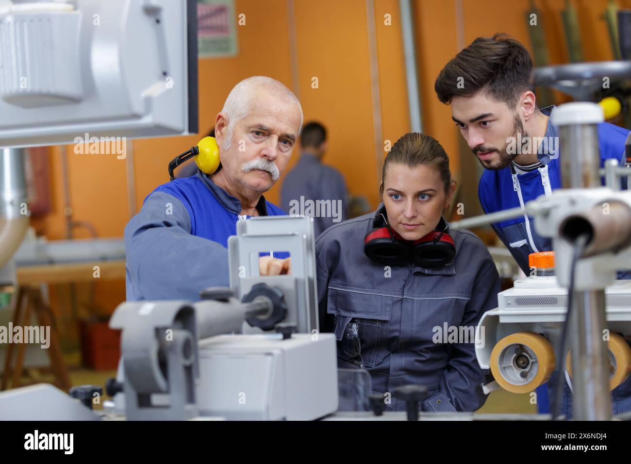 Woman operating cnc machine hi-res stock photography and images - Alamy