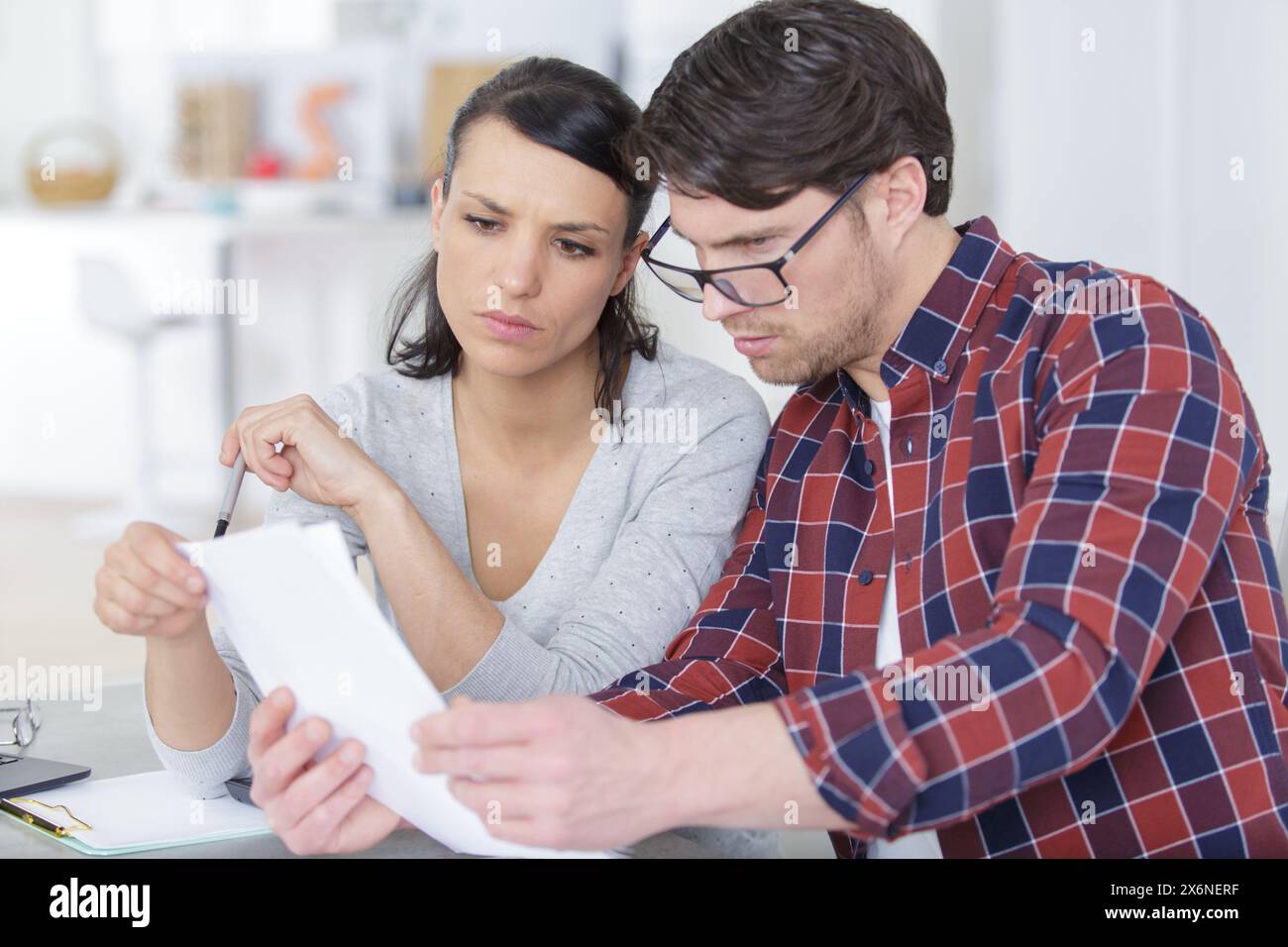 Woman managing finances laptop young hi-res stock photography and ...