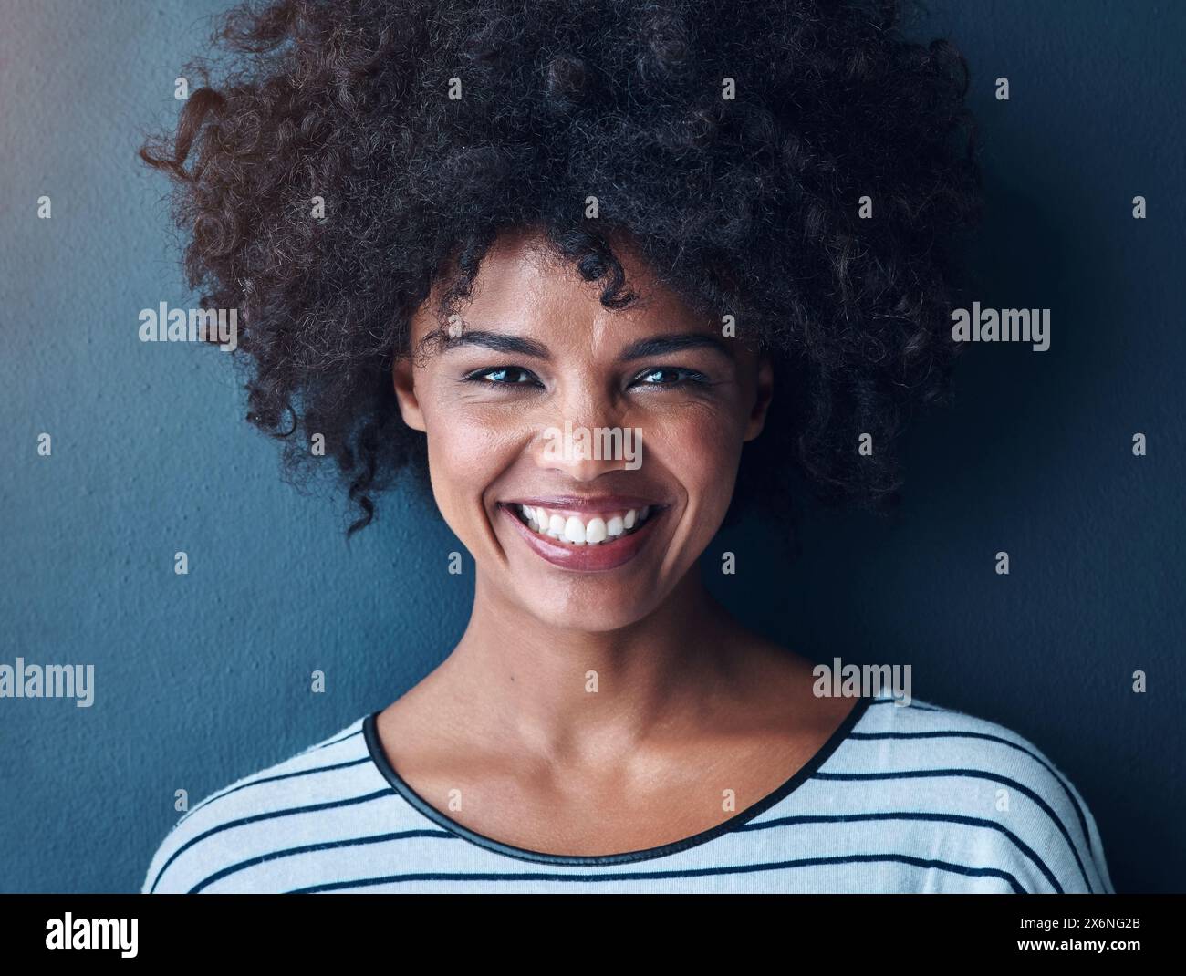 Black woman, smile and portrait with funny, glow and confident on blue ...