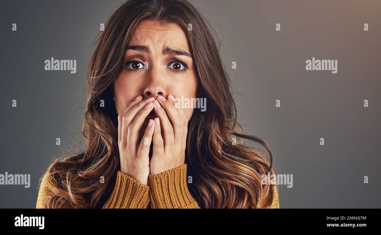 Portrait, scared and woman with fear, surprise and emotions with secret ...