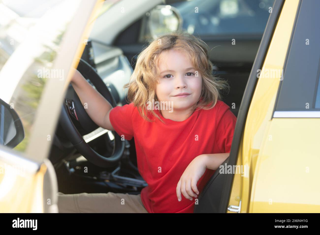 Child Driver. Little kid driving car. Kid Are Sitting At The Wheel ...
