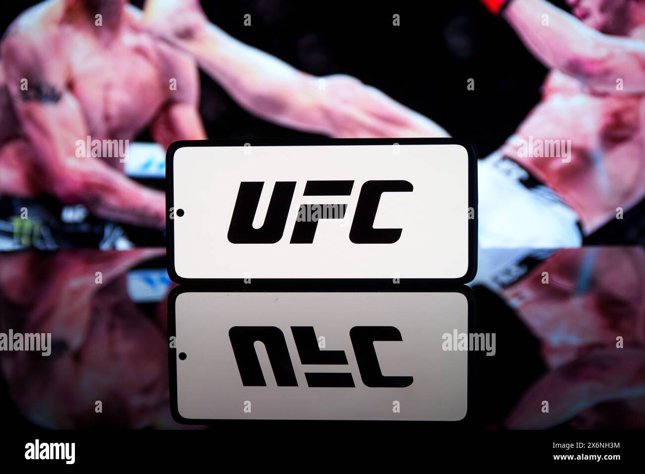 UFC logo shown on phone screen. Ultimate Fighting Championship Stock ...