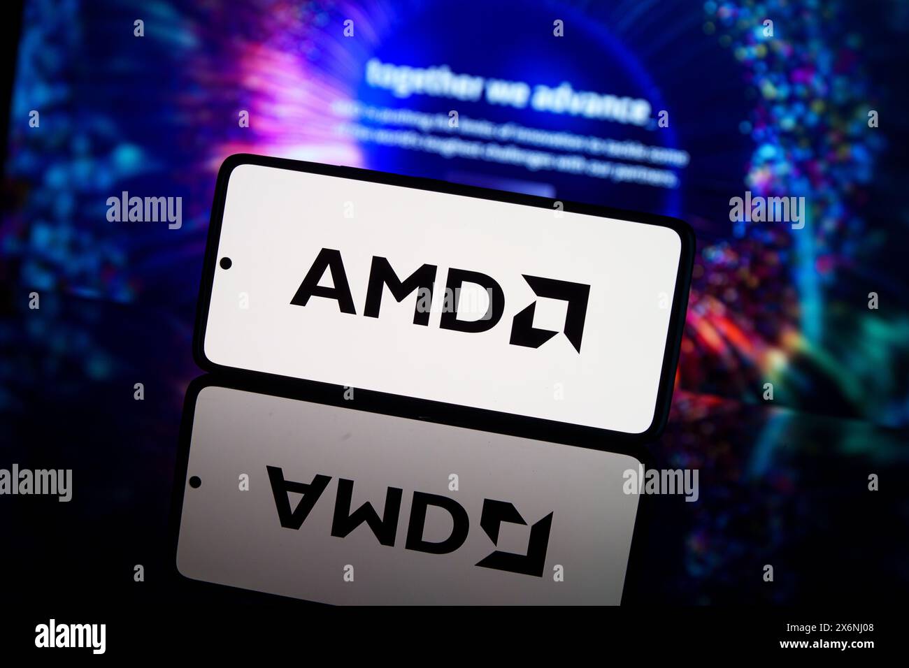 AMD company logo shown on phone screen. Advanced Micro Devices Stock ...