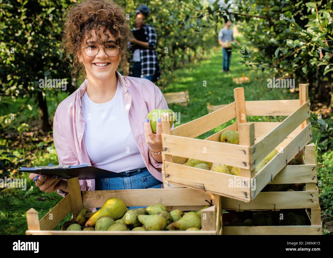 Smiling young female agronomist hi-res stock photography and images - Alamy