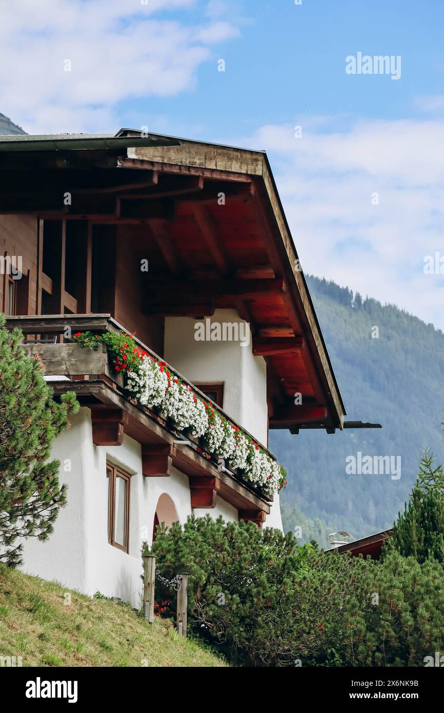 Beautiful traditional Austrian facades decorated with flowers Stock ...