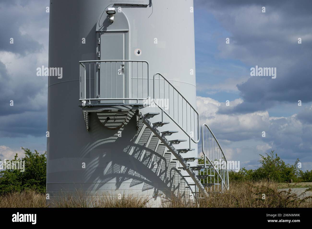 wind turbine tower with stairs and shadow in the sunshine Stock Photo ...