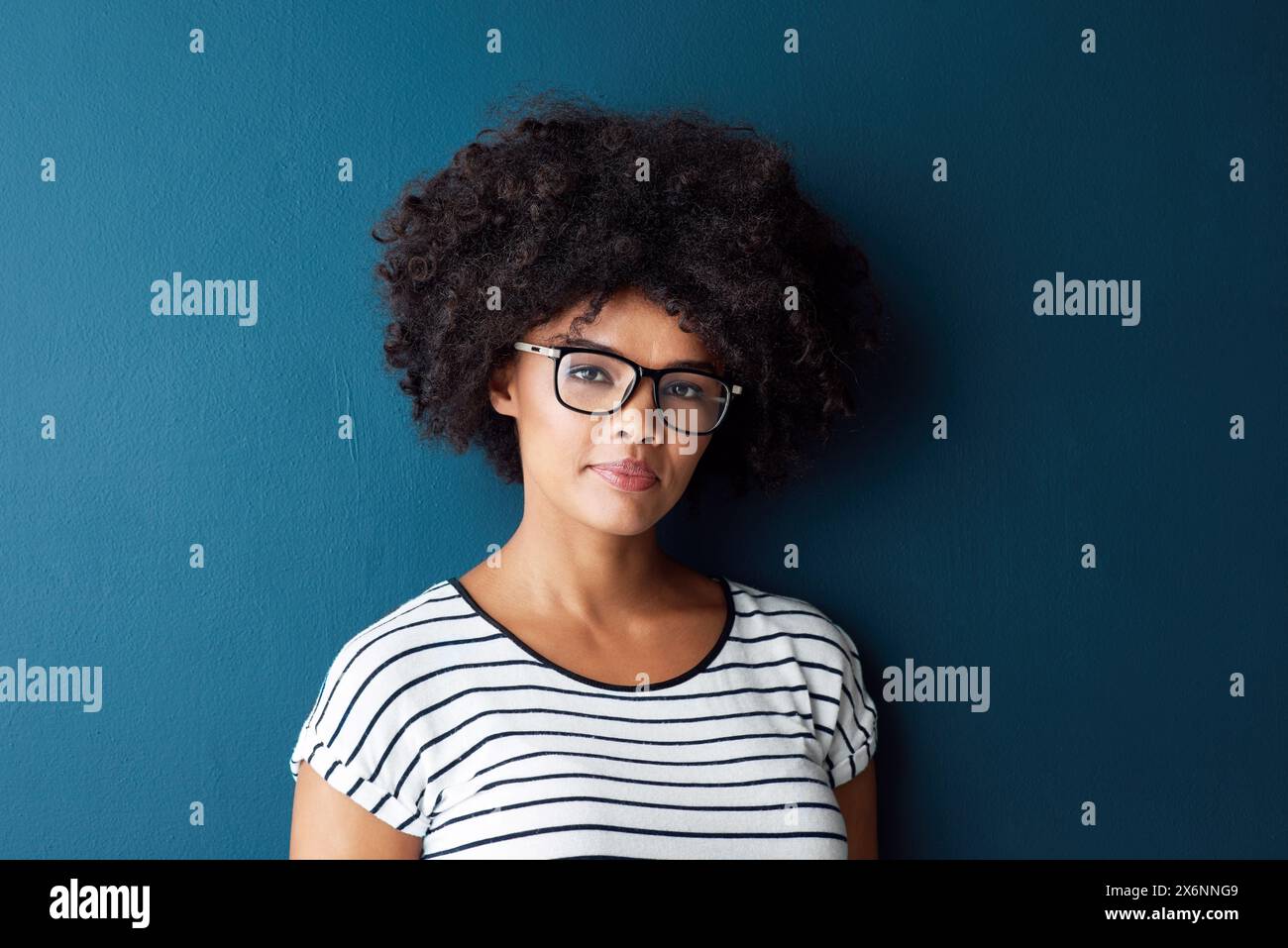 Black woman, portrait and serious with glasses for optometry or vision ...