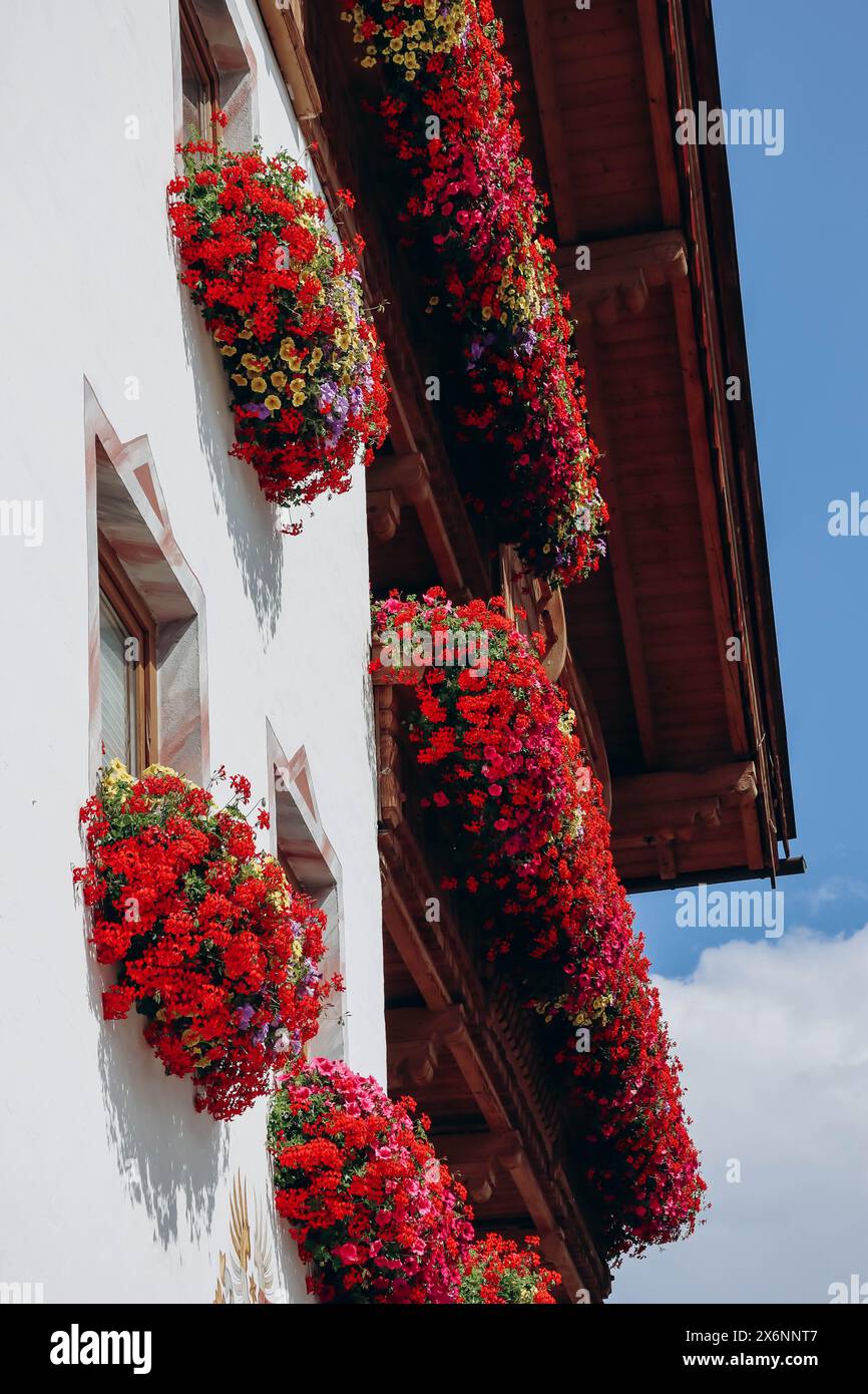 Beautiful traditional Austrian facades decorated with flowers Stock ...