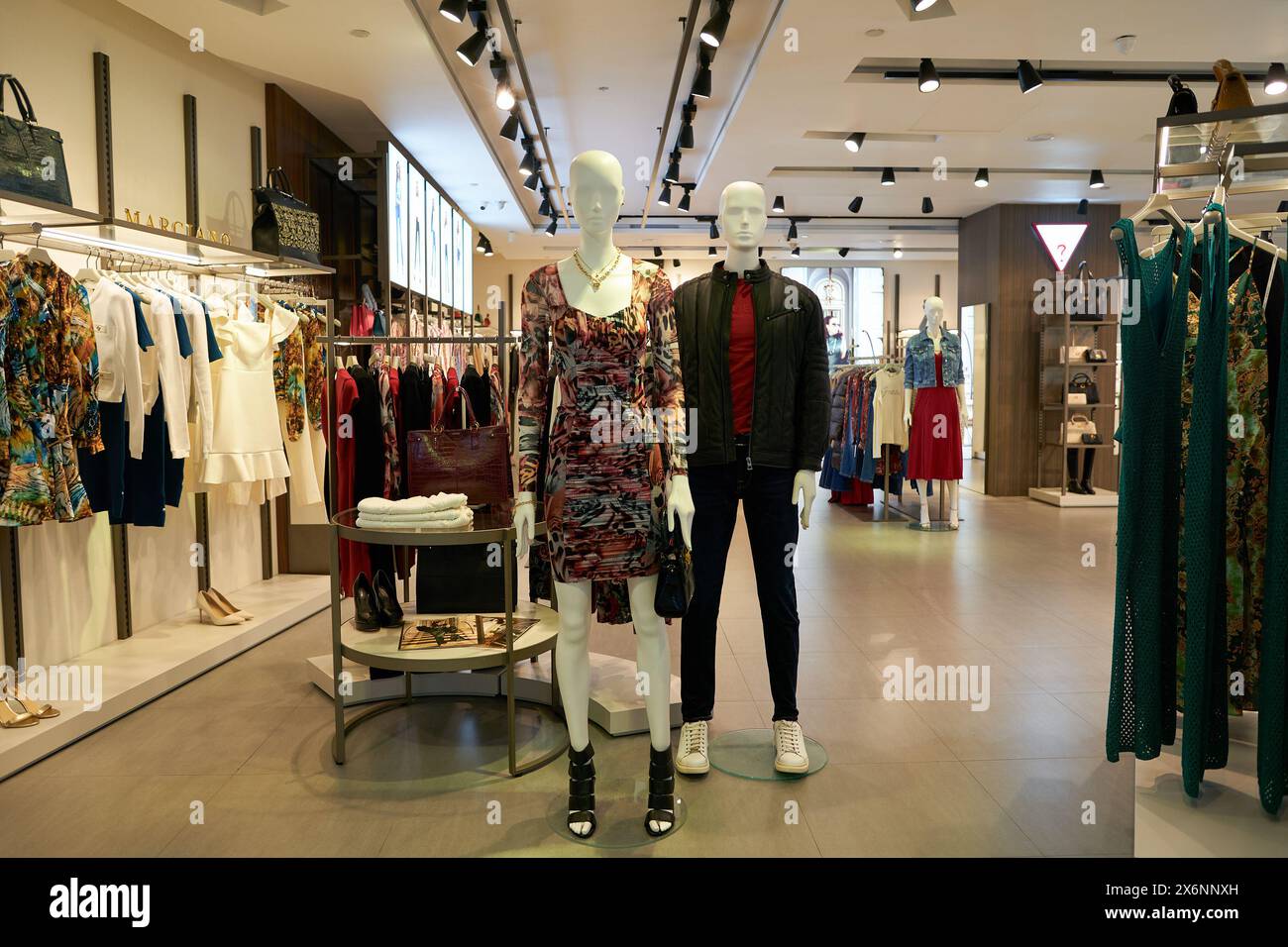 SINGAPORE - NOVEMBER 06, 2023: dressed mannequins displayed at Guess ...