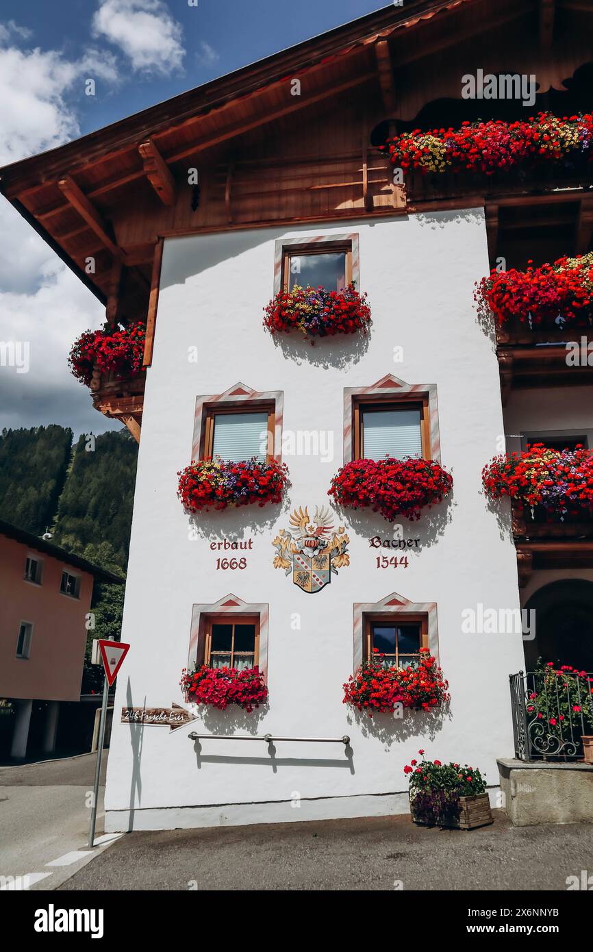 Beautiful traditional Austrian facades decorated with flowers Stock ...