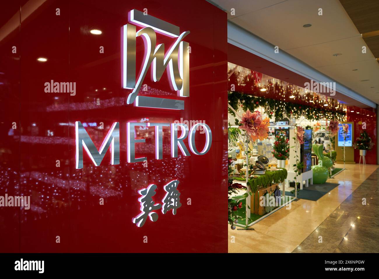 SINGAPORE - NOVEMBER 06, 2023: close up shot of Metro sign as seen in ...
