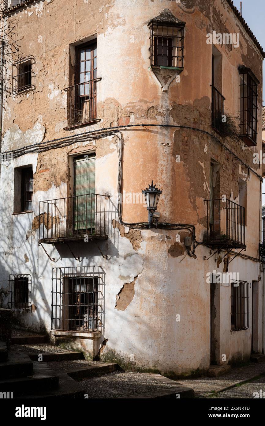 Section of an old, rundown, deteriorating exterior of a buildingwith ...