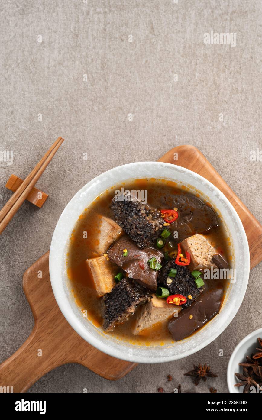 Delicious spicy duck blood jelly soup bowl and stinky tofu with ...