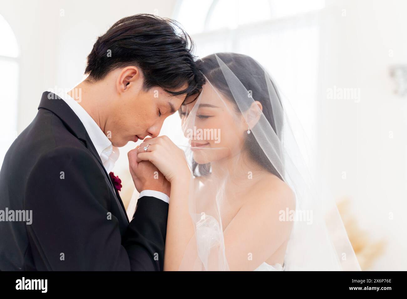 Bride and groom showcase their rings, a close-up view., symbolizing ...