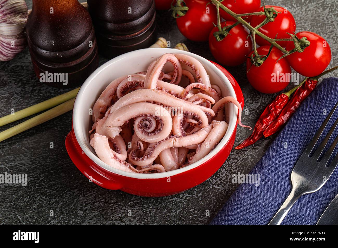 Delicous marinated squid tentacles snack in the bowl Stock Photo - Alamy