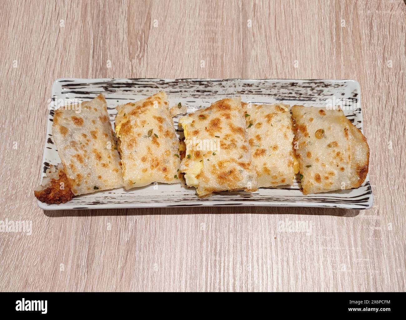 Taiwan breakfast cheese egg cake Stock Photo - Alamy