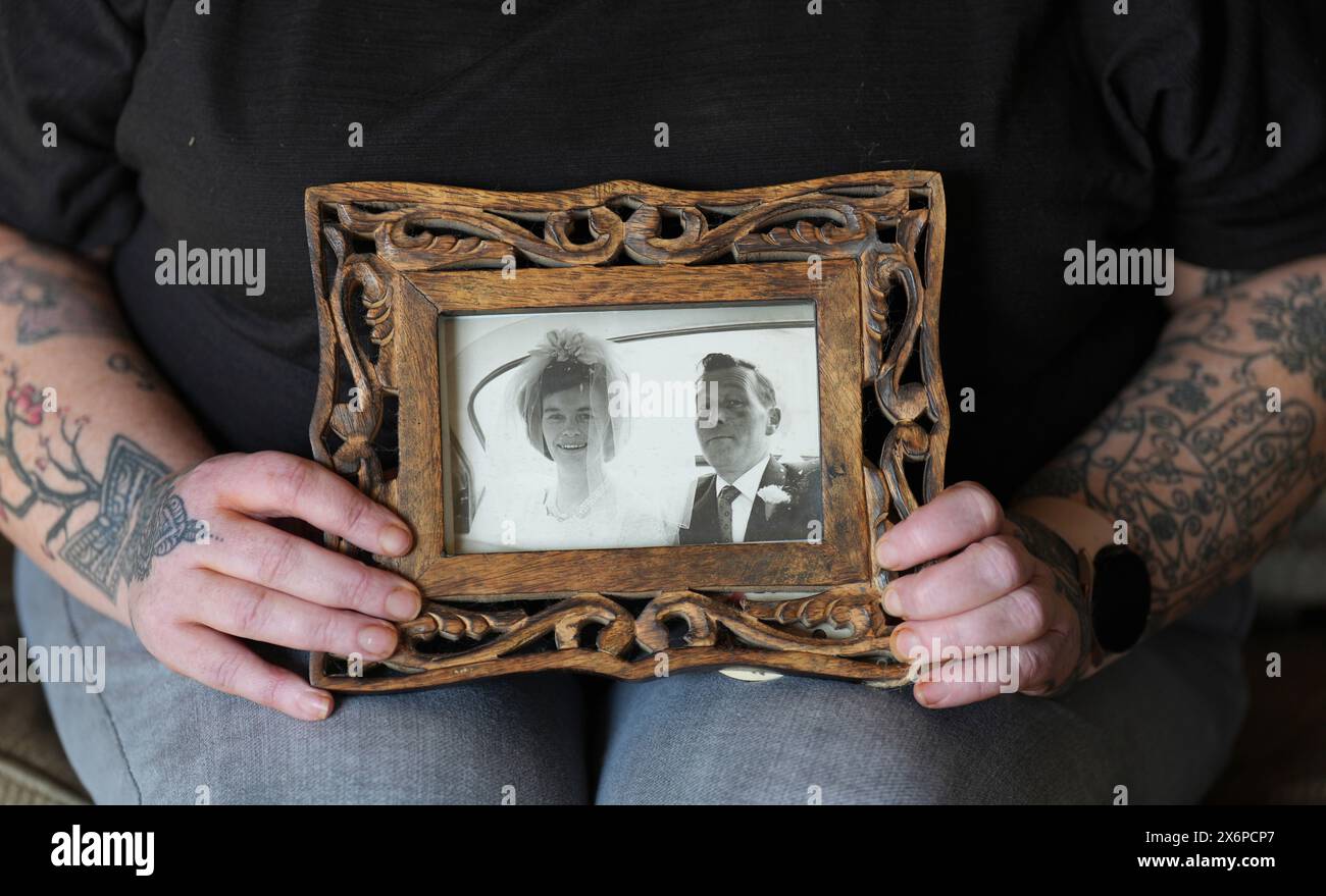 RETRANSMITTING STORY CHANGED TO IRISH Bombings Sharon Askin holding a ...
