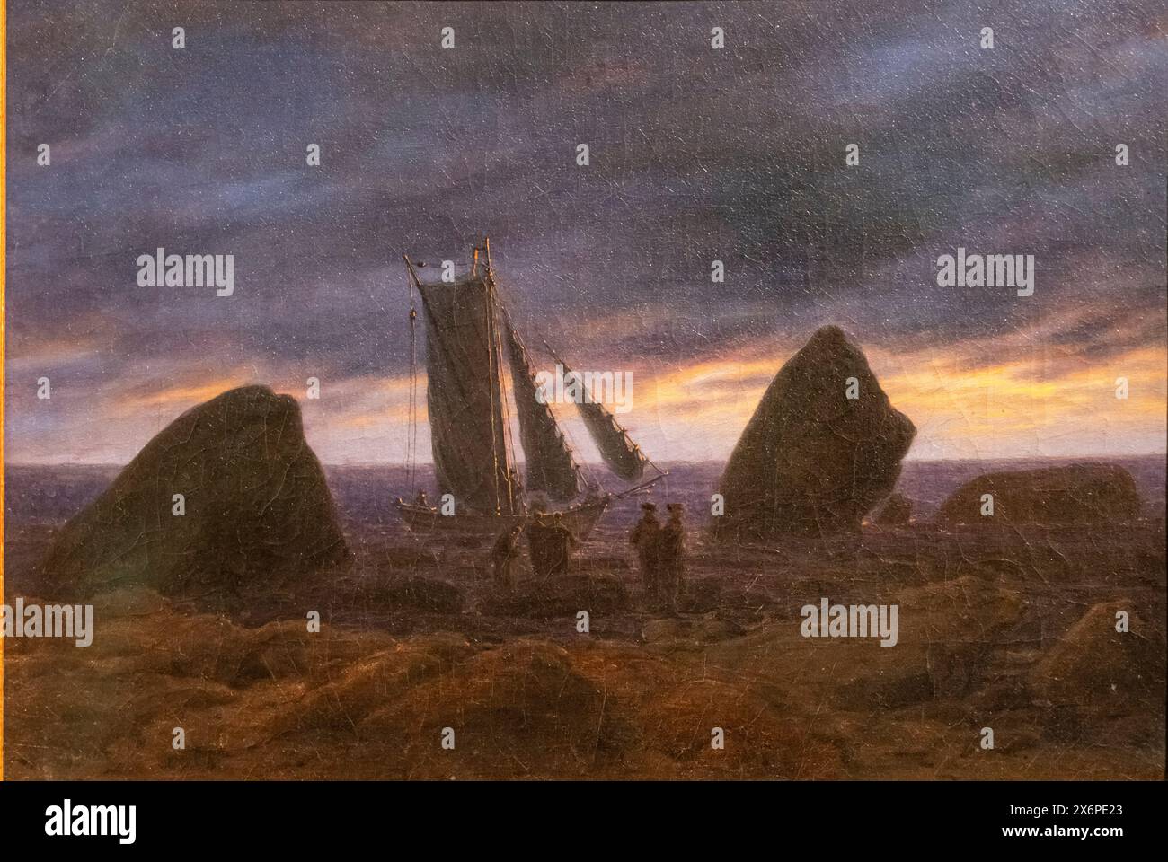 Fishing boat between two rocks by a baltic beach hi-res stock ...