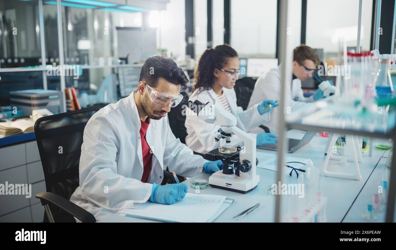 Medical Science Laboratory: Row of Diverse Team of Multi-Ethnic Young ...