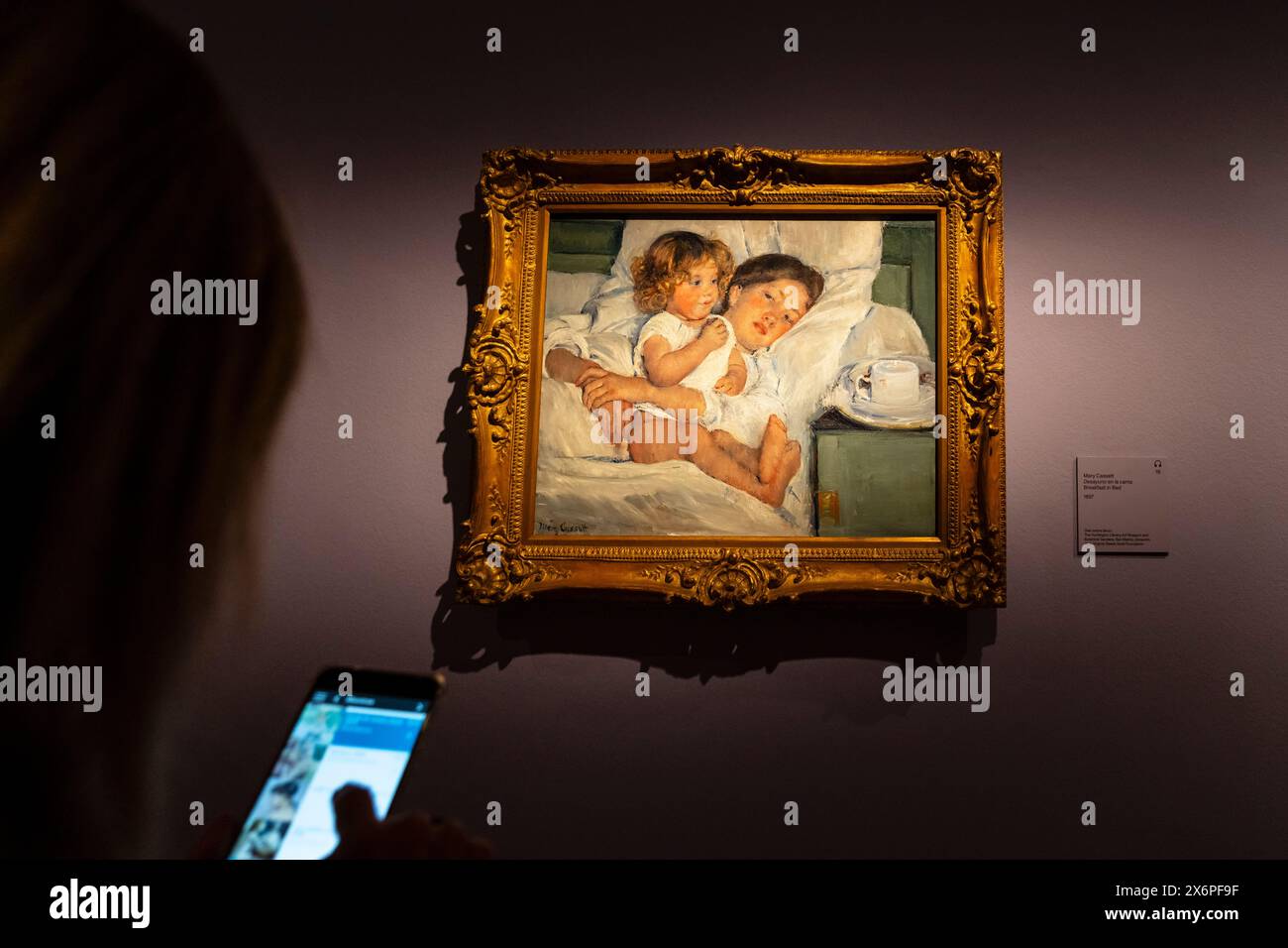 consulting the mobile in front of a work of art, Mary Cassatt ...