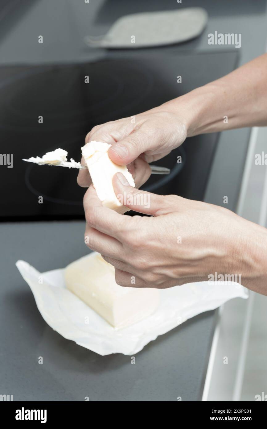 Applying butter hi-res stock photography and images - Alamy