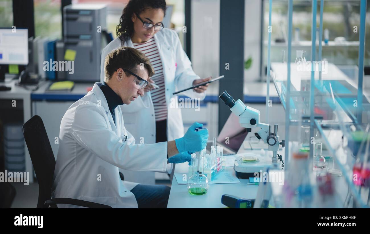 Modern Medical Research Laboratory: Portrait of Two Young Scientists ...