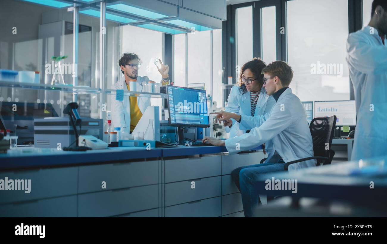 Young scientist analysing samples hi-res stock photography and images - Alamy