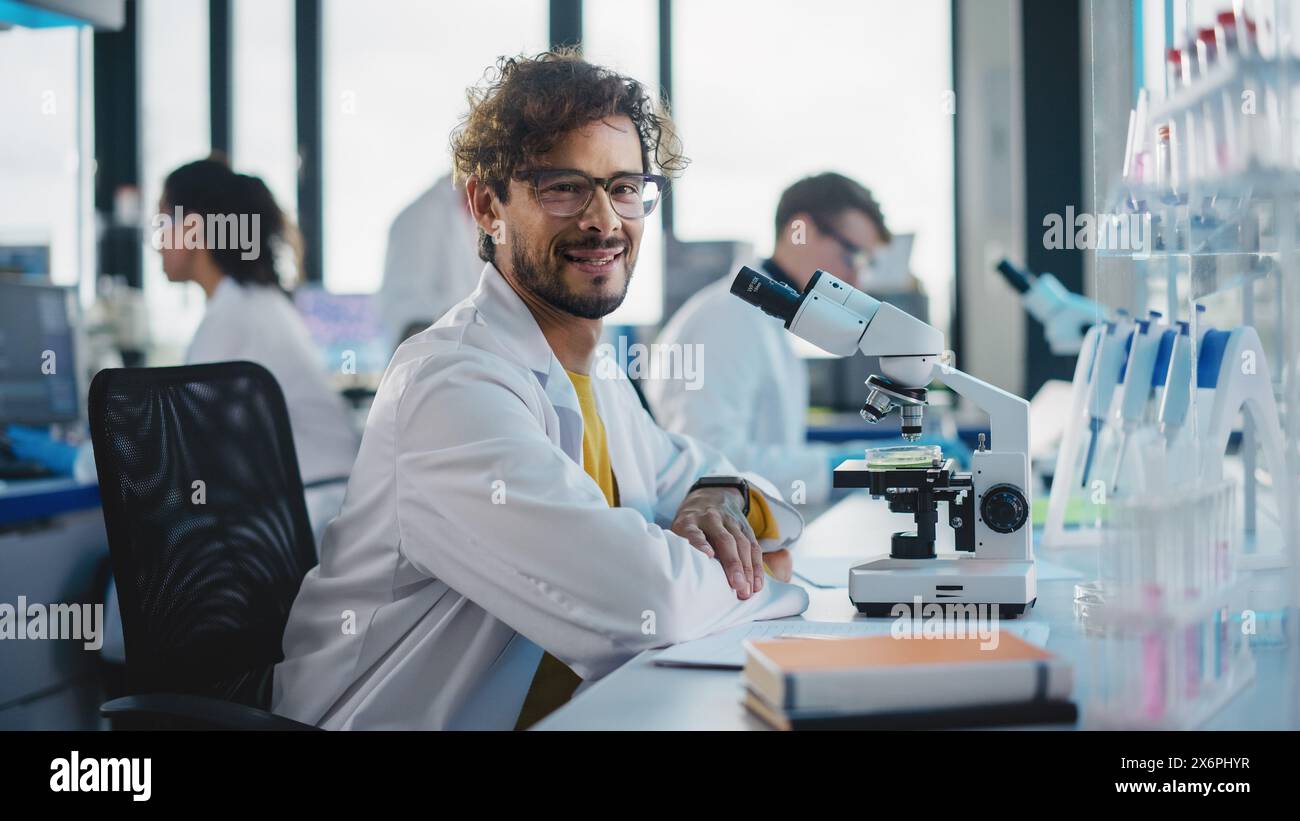 Scientist using microscope in lab hi-res stock photography and images ...