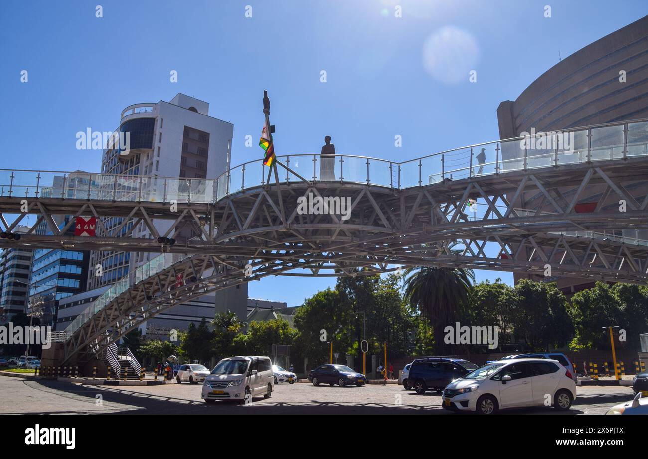 Harare, Zimbabwe, 21st April 2024: Pedestrian bridge with the statue of ...