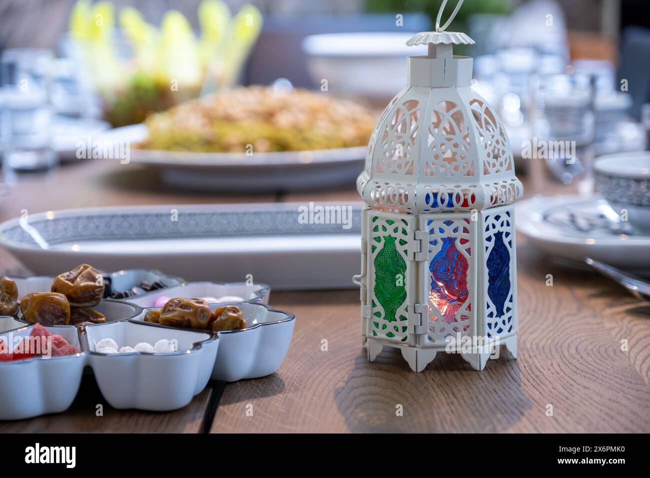 Ramadan lantern and dates on dinner table for taking and eating on ...