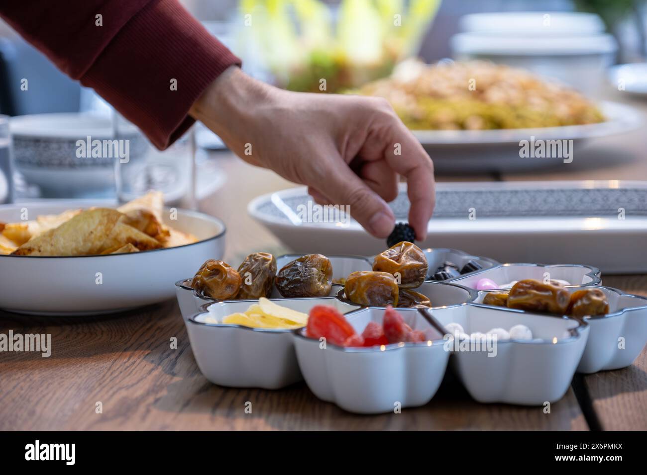 Ramadan lantern and dates on dinner table for taking and eating on ...