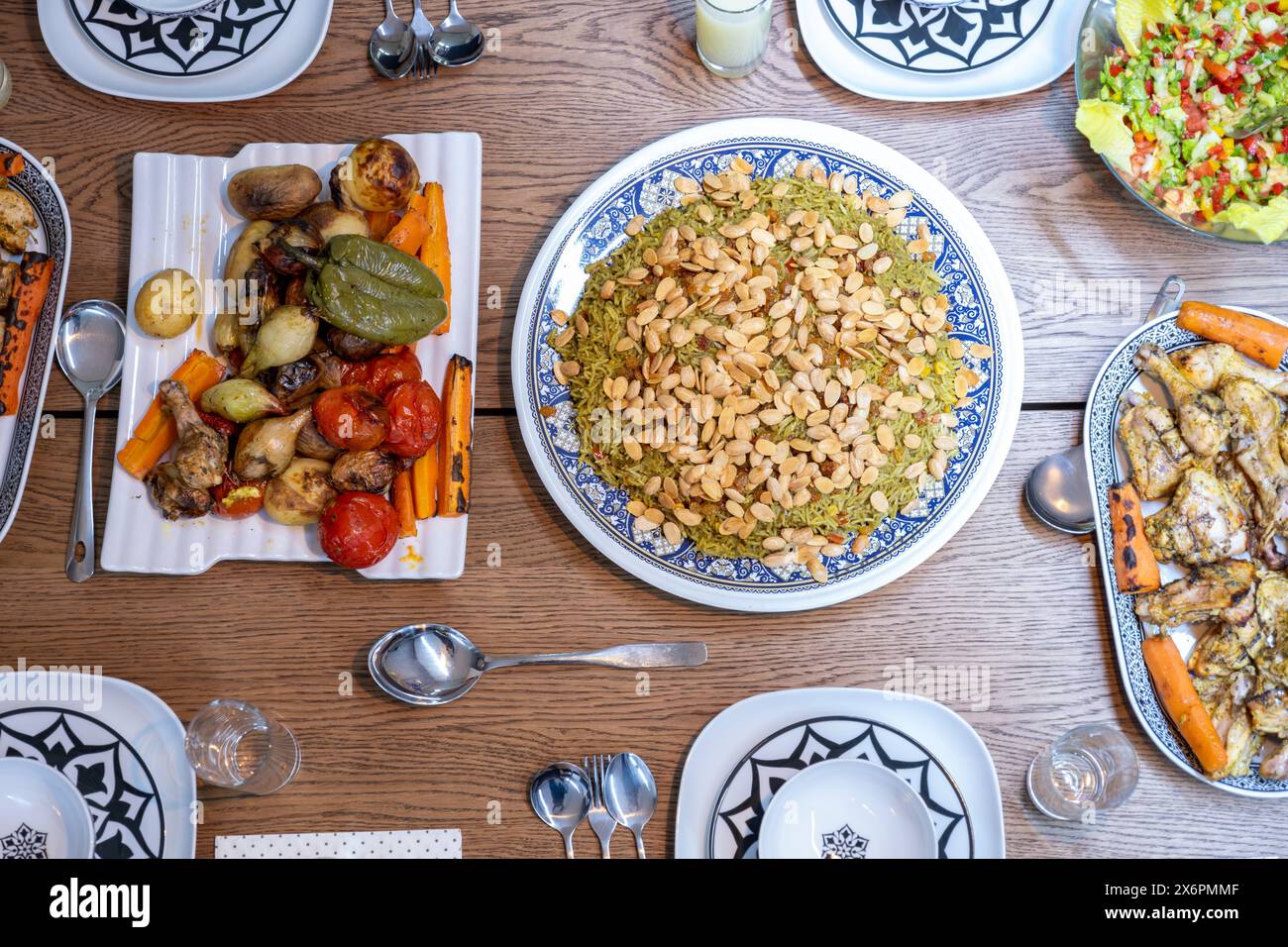 Rice plate on dinner table from top view for kabsa and sambousek ...