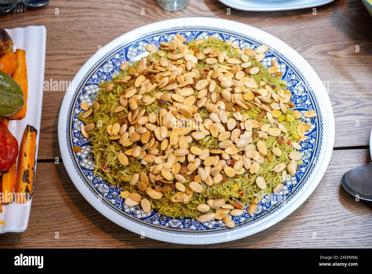 Rice plate on dinner table from top view for kabsa and sambousek ...